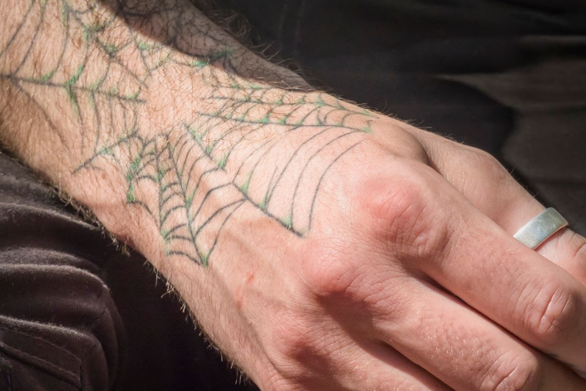 What Is the Real Meaning Behind a Spider Web Tattoo? | HowStuffWorks